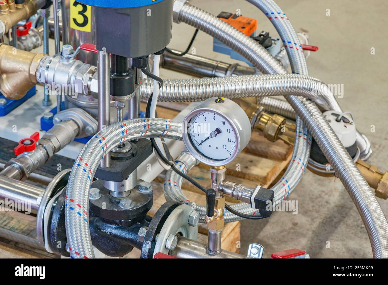 Machine parts inside of the factory Stock Photo - Alamy