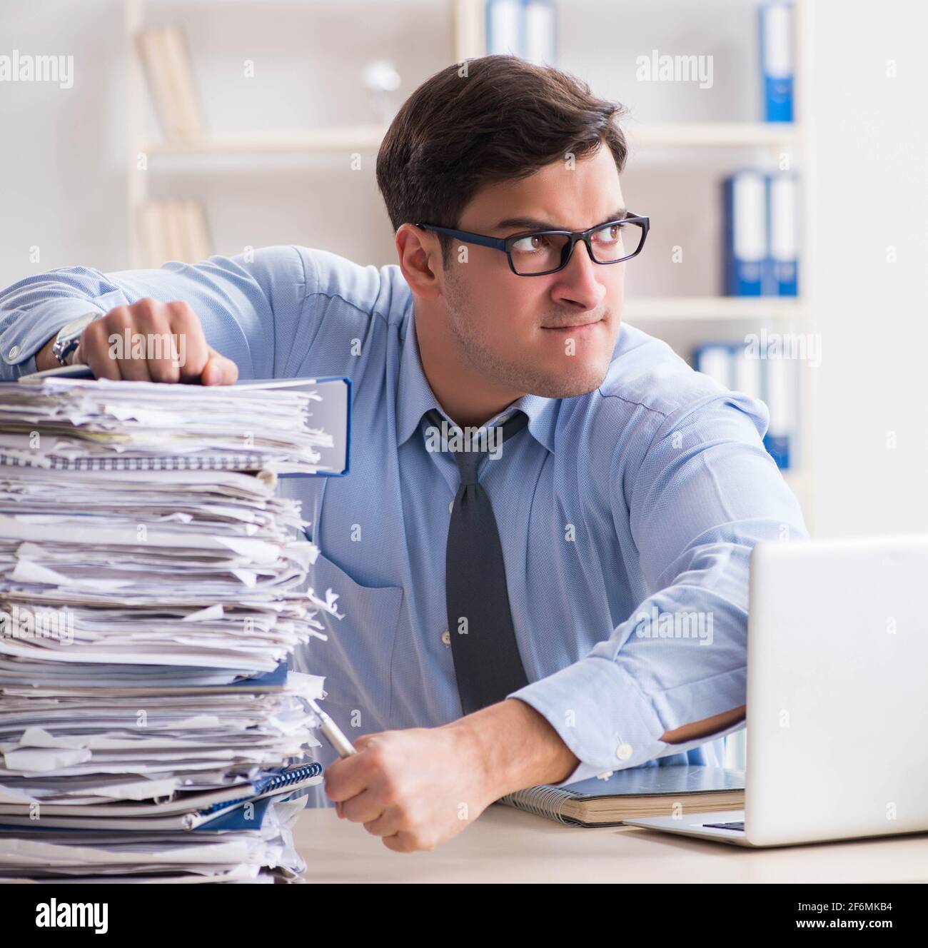 The extremely busy businessman working in office Stock Photo - Alamy