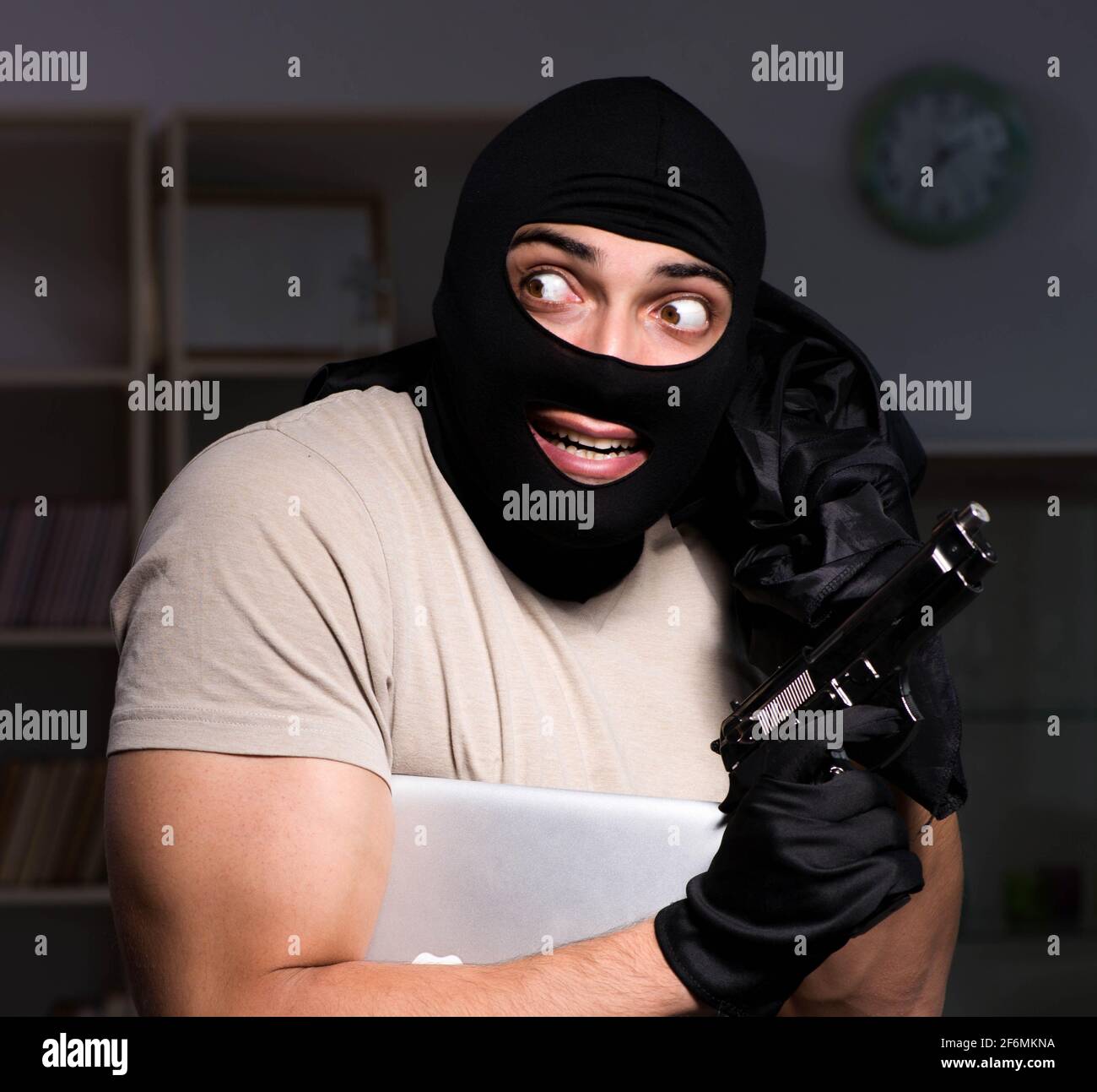 The burglar wearing balaclava mask at crime scene Stock Photo - Alamy
