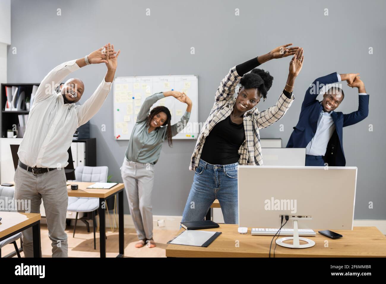 Company Fitness Stretch Exercise. African Corporate Business Group ...