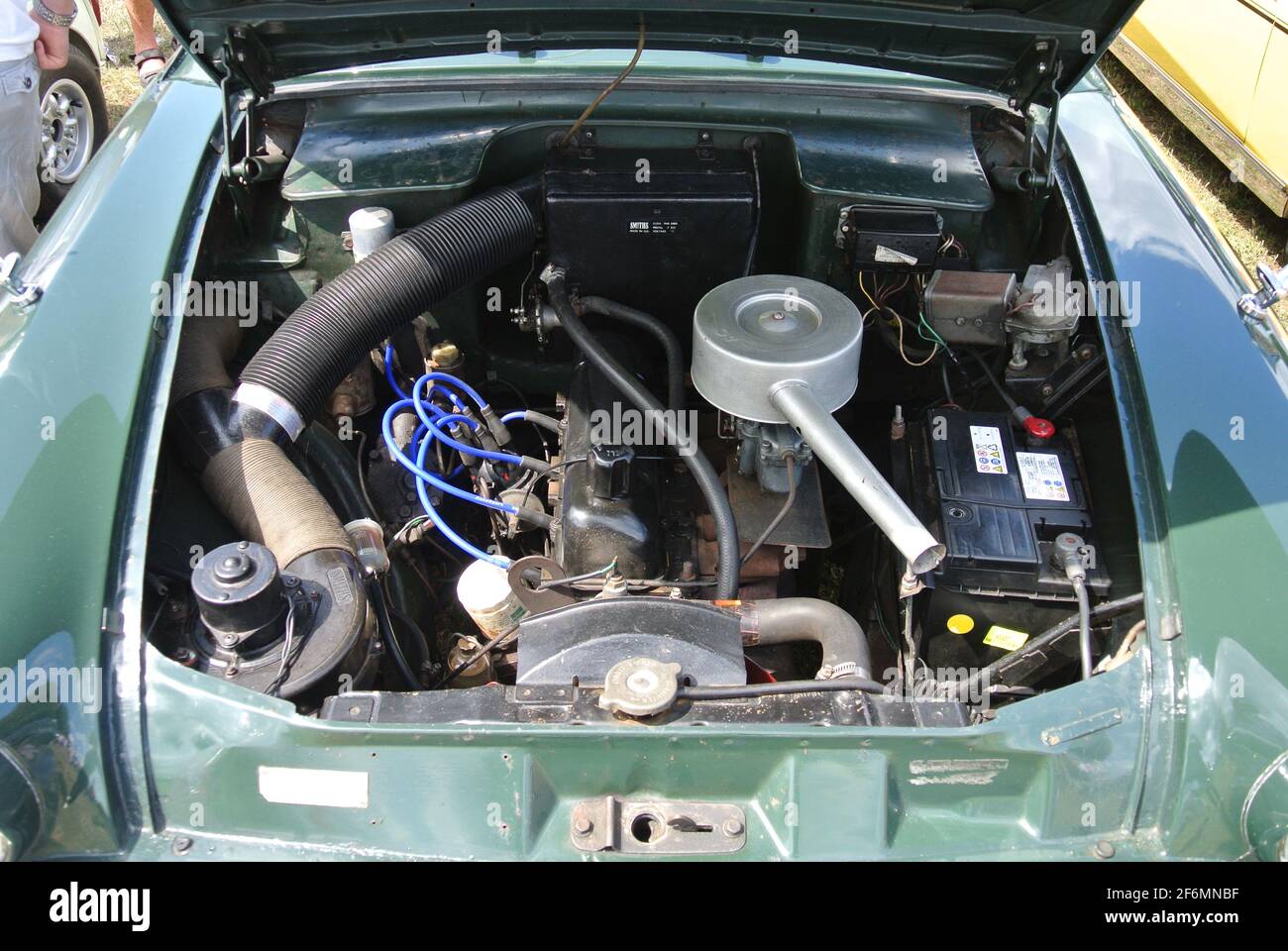 The engine of a 1964 Hillman Minx parked up on display at the English ...