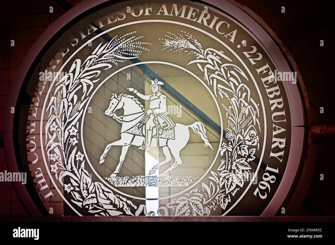 An etched drawing of Jefferson Davis decorates a window at the ...