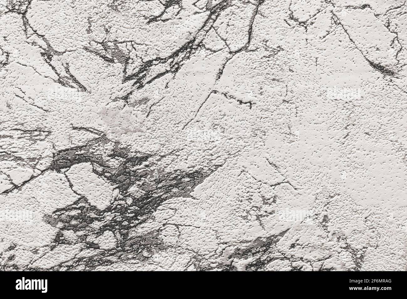 Texture of light wallpaper with abstract dark cracked pattern, paper ...