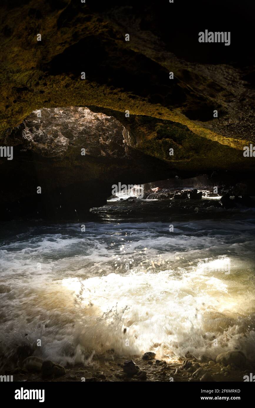 Spectacular Mermaid Caves with sunlight piercing through hole in ...