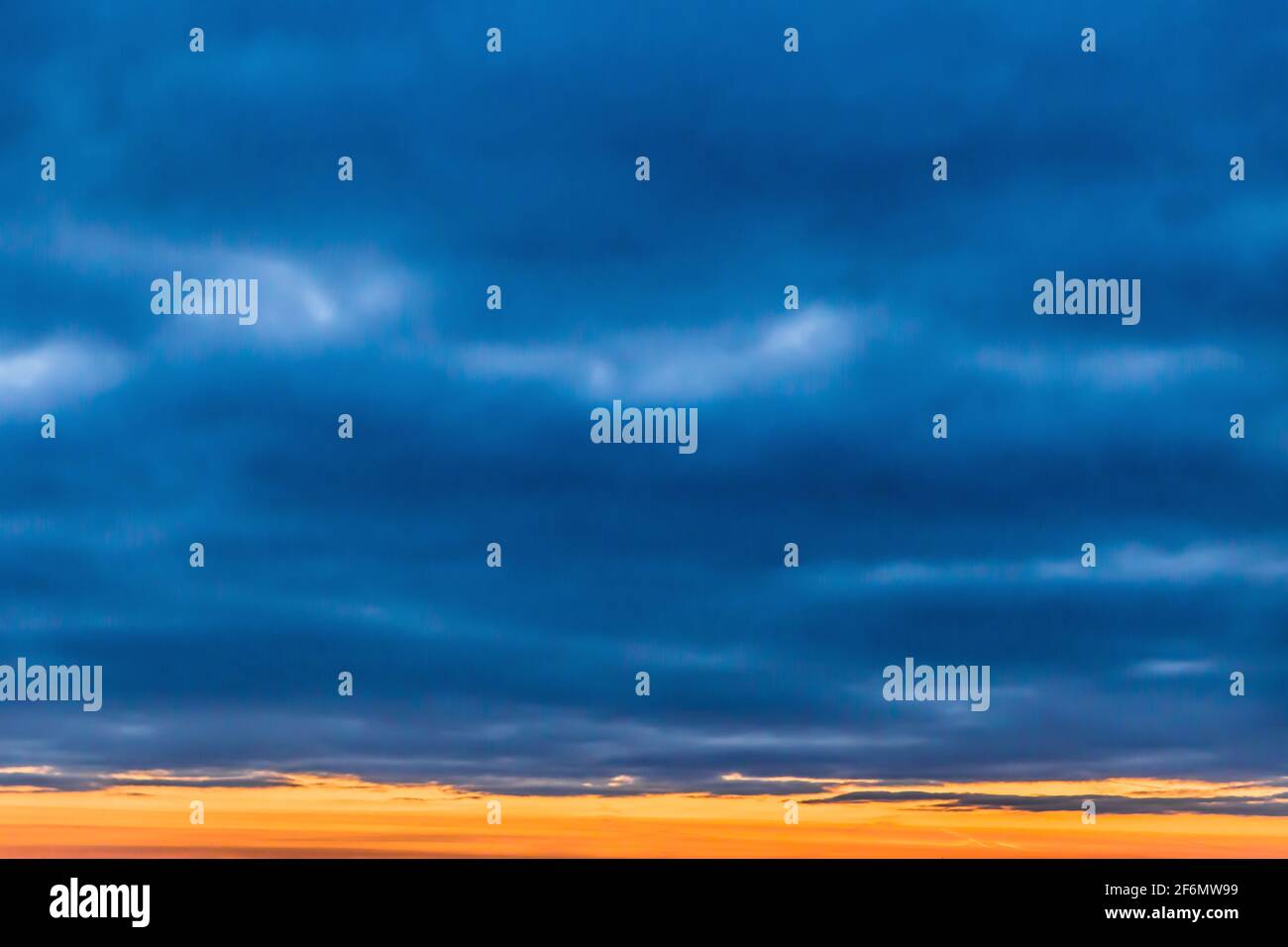 Dark blue rain clouds and skyline sunset background, soft focus Stock ...