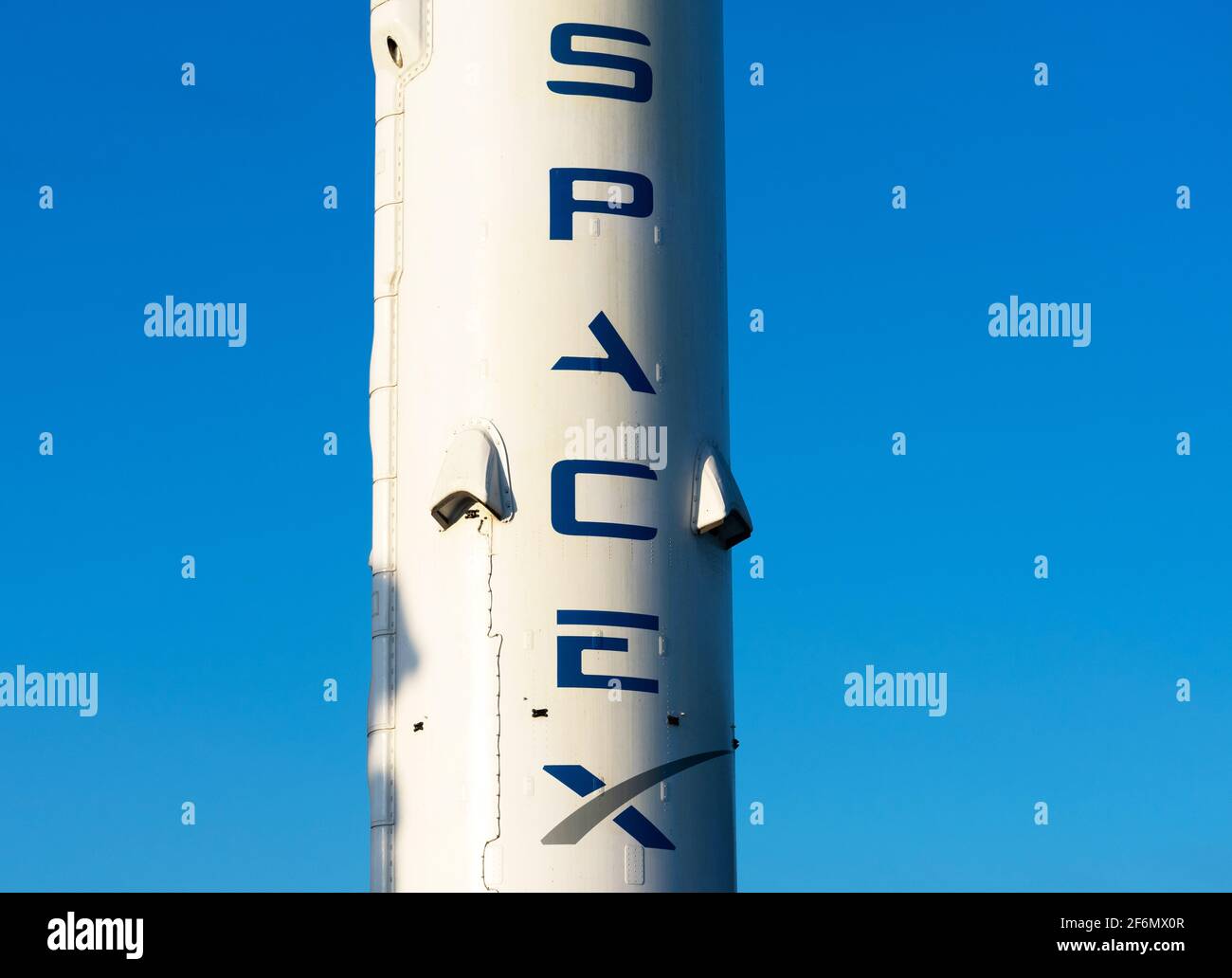 SpaceX sign logo on Falcon 9 rocket booster displayed at SpaceX ...