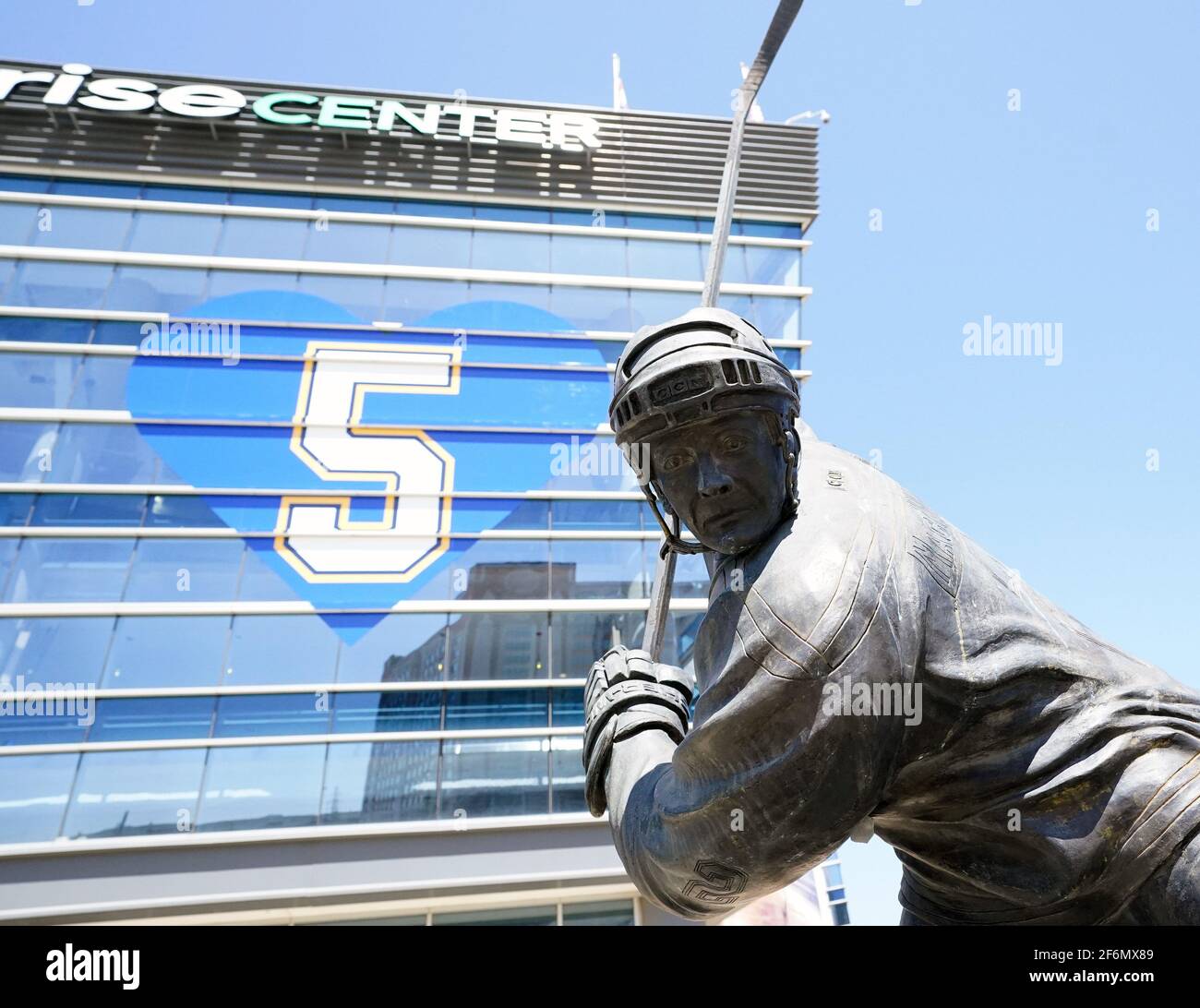 St. Louis, United States. 01st Apr, 2021. In the shadows of a statue of ...