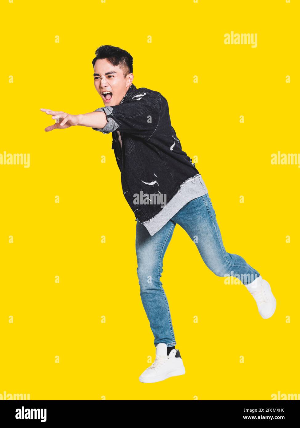 Excited young casual man hi-res stock photography and images - Alamy