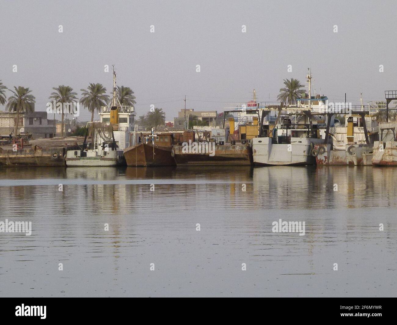 basra, Iraq - april 27, 2018: photo of boat in the river in basra city ...