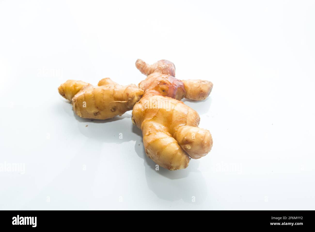 Fresh ginger on white background, herb medical concept Stock Photo - Alamy
