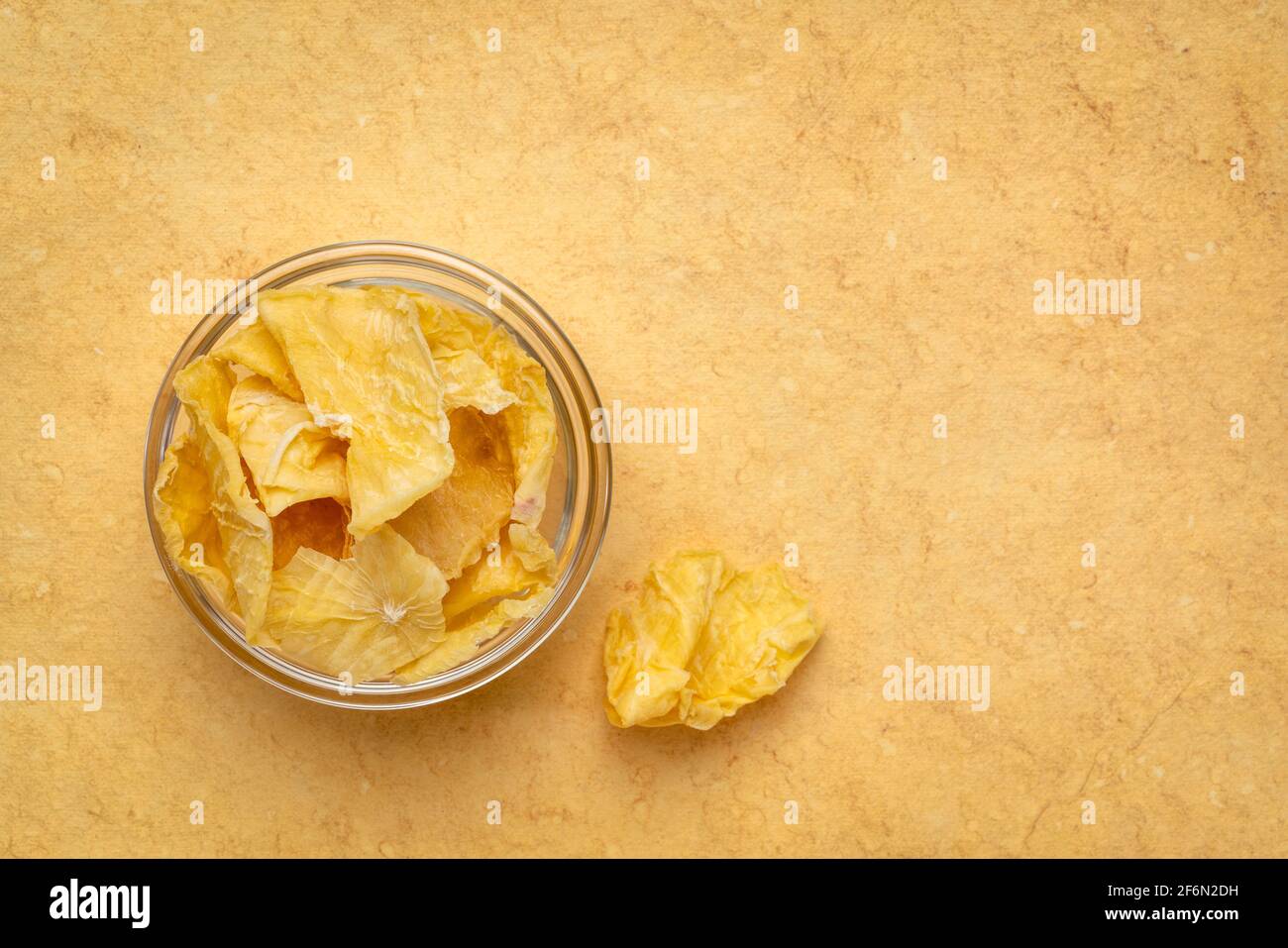 Bowl of dried slices of yacon tuber. Yacon contains inulin, a complex ...