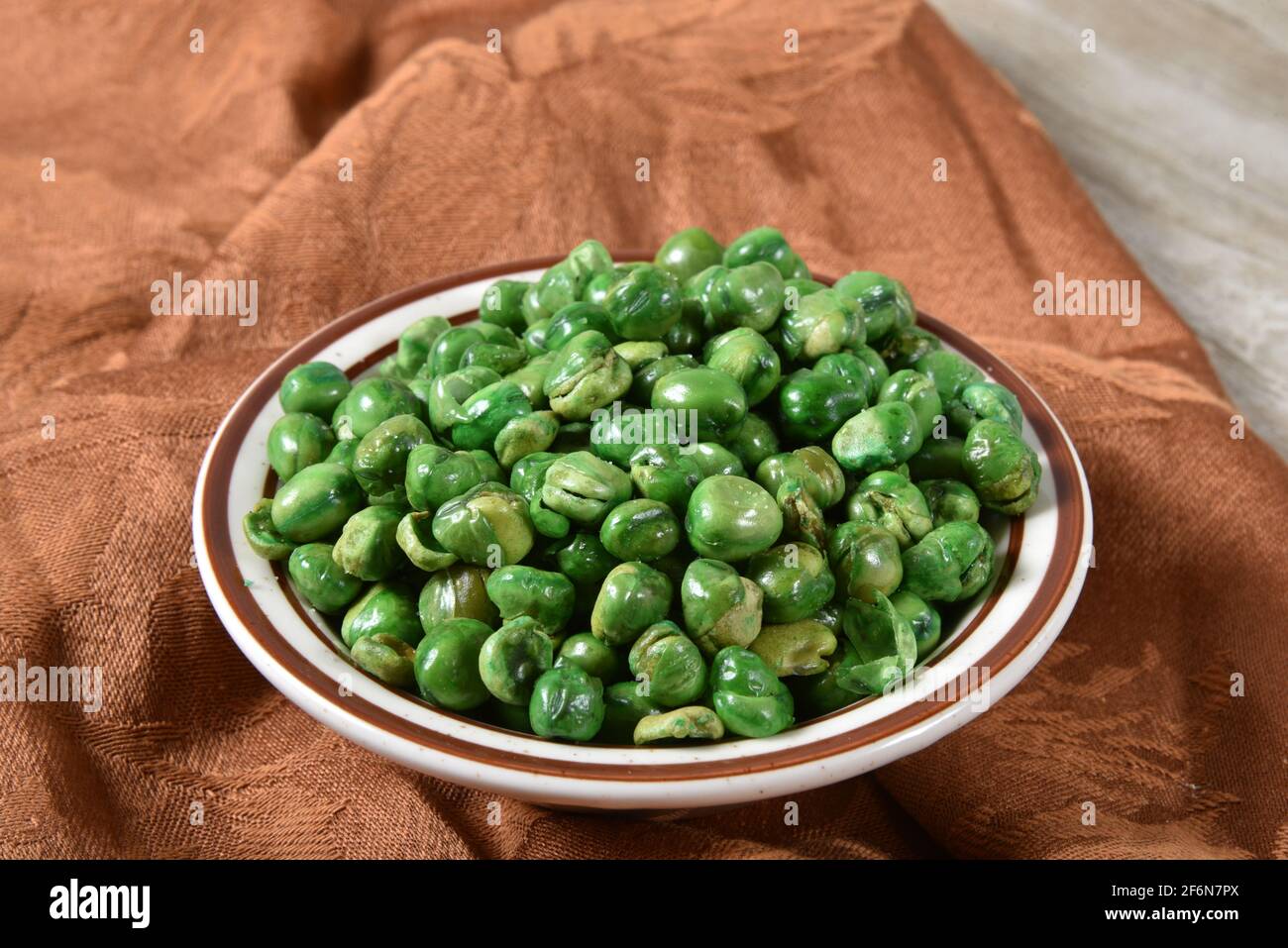 A bowl of healthy fried peas for a nutritious snack Stock Photo - Alamy