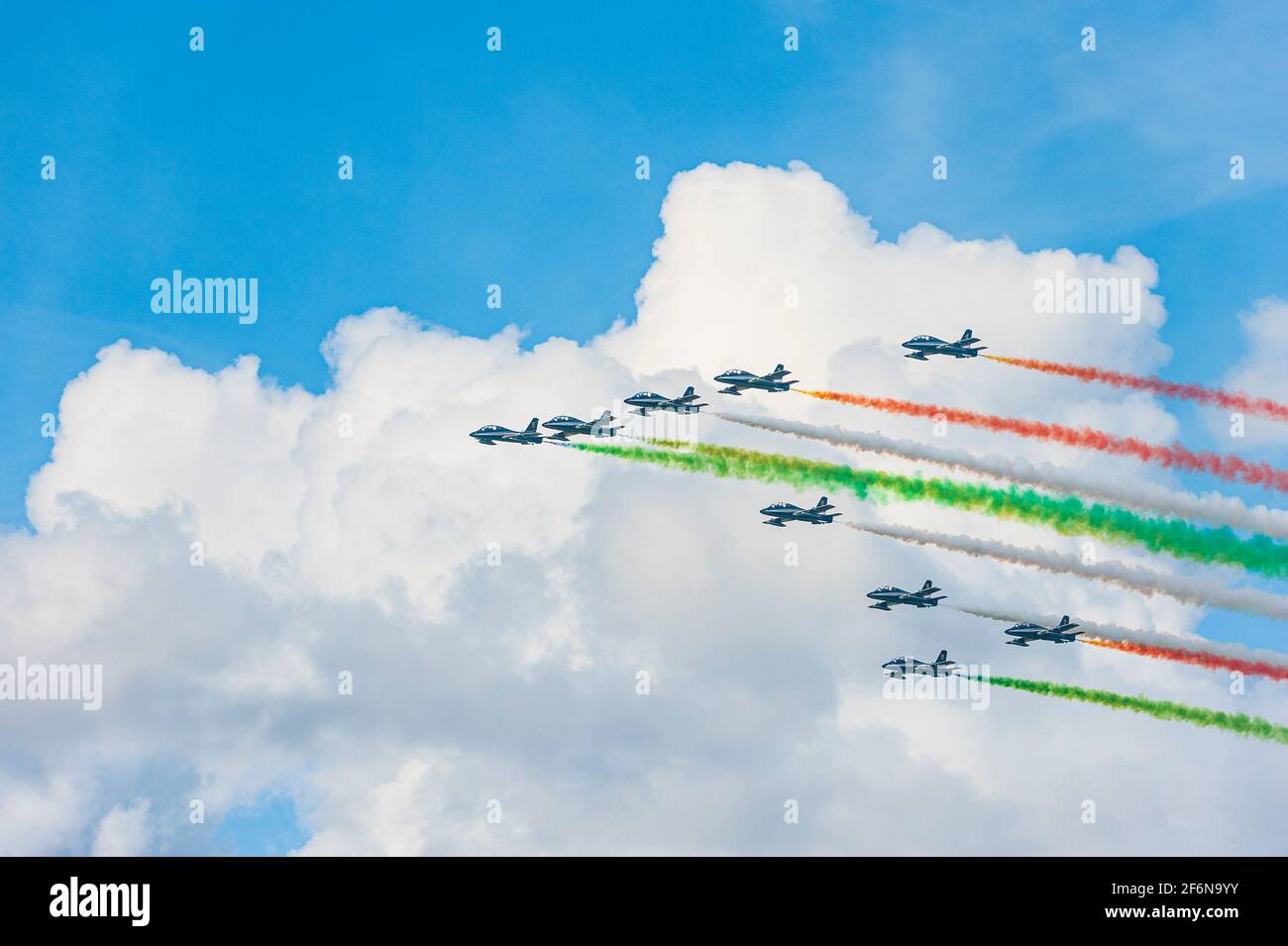 Frecce Tricolori making the Italian flag with smoke Stock Photo - Alamy