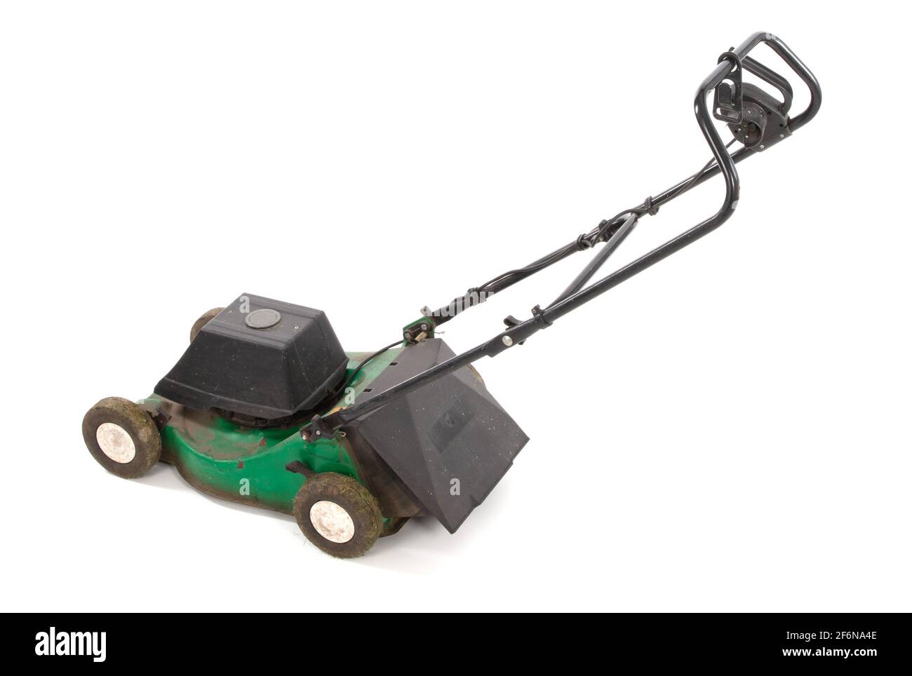 Old green lawn mower - Isolated on white background Stock Photo - Alamy
