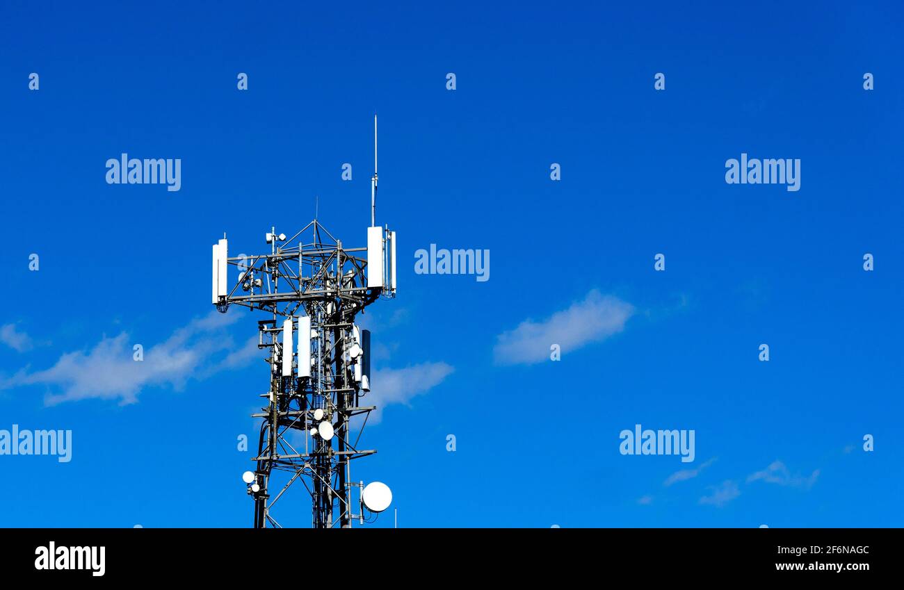 Modern telecommunications tower array Stock Photo - Alamy
