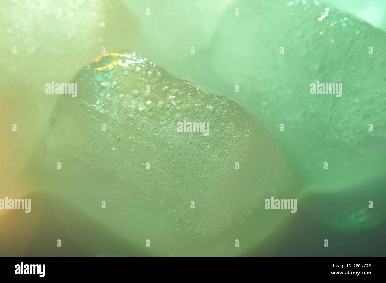 Clear green ice box cube macro close up view Stock Photo - Alamy