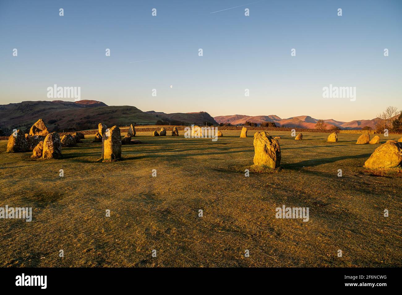 Castlerigg Stone Circle at sunrise, with a view to the mountains Stock ...