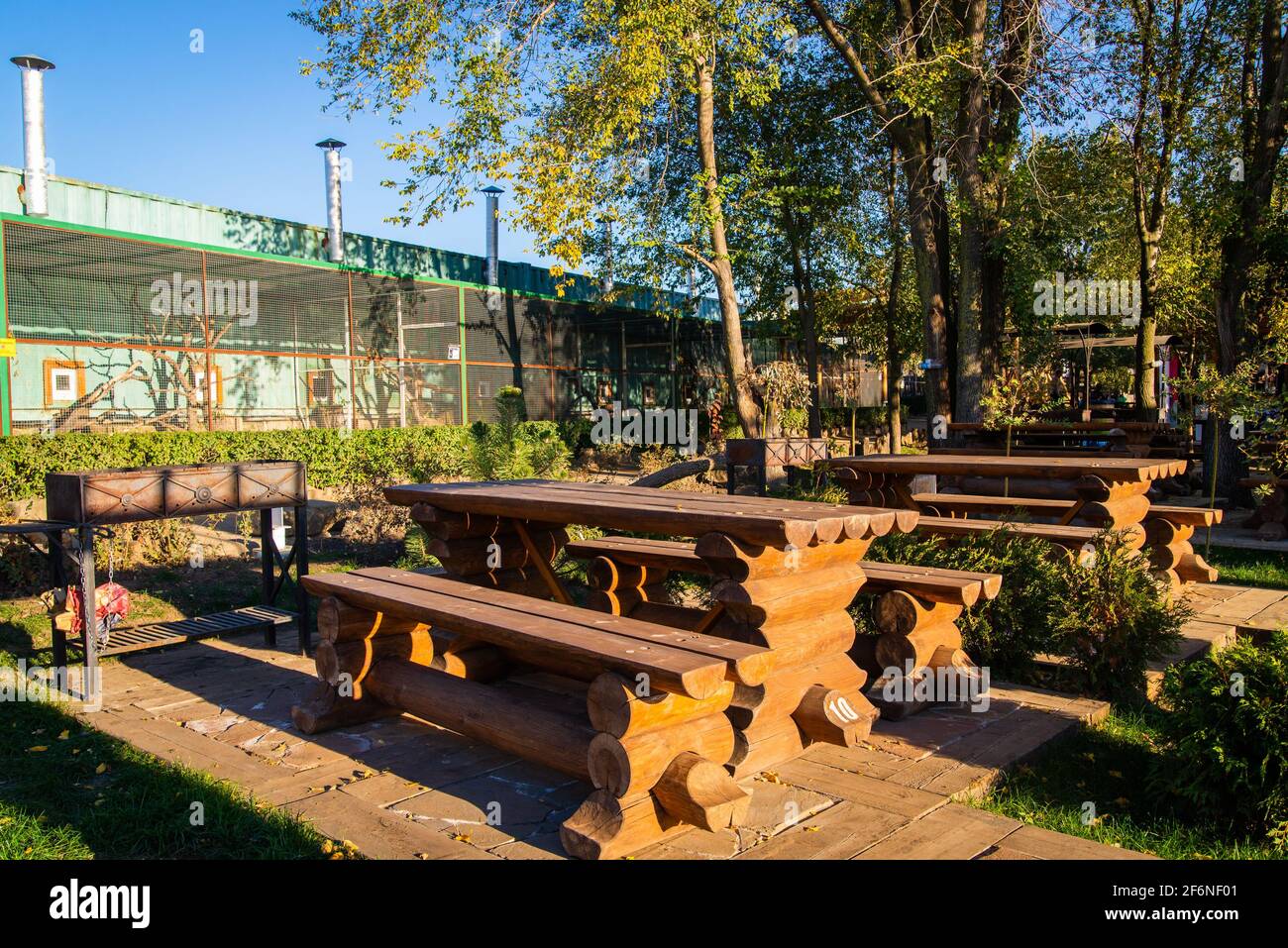 Rest area, BBQ place with table and benches Stock Photo - Alamy