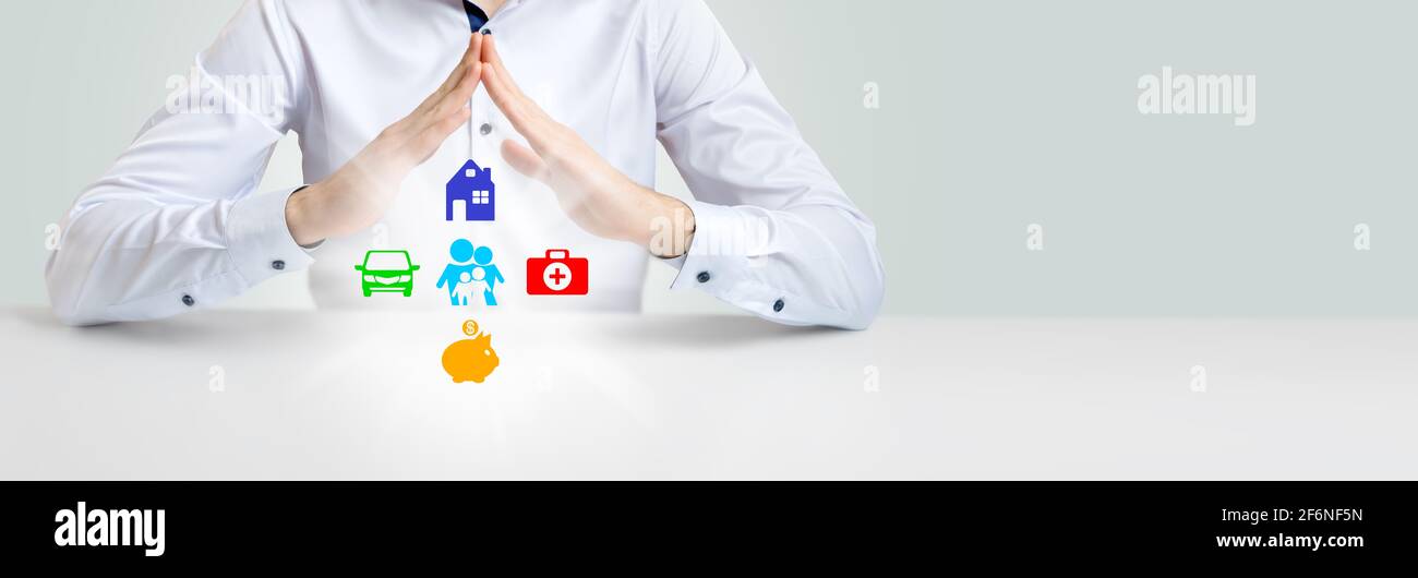 The insurance agent on a light background in a white shirt, folded his ...