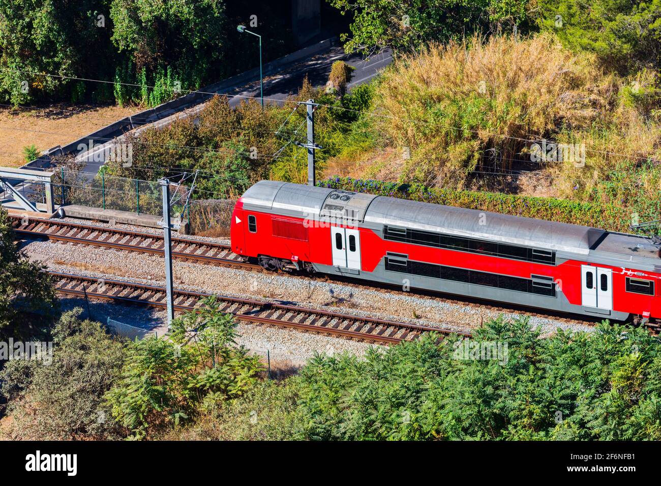 Red modern train public transport in Europe Stock Photo - Alamy