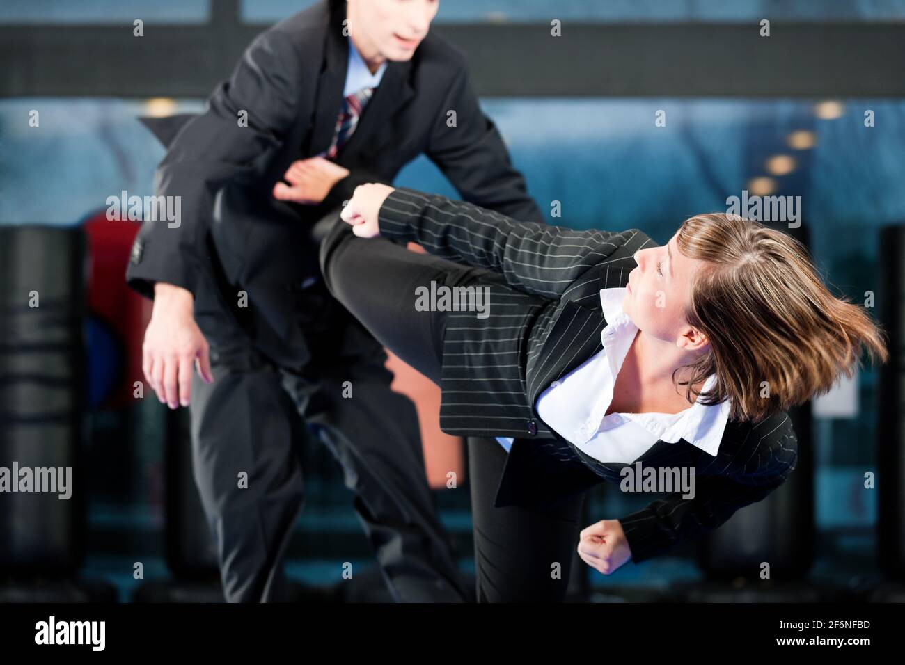 People fighting in business suits hi-res stock photography and images ...