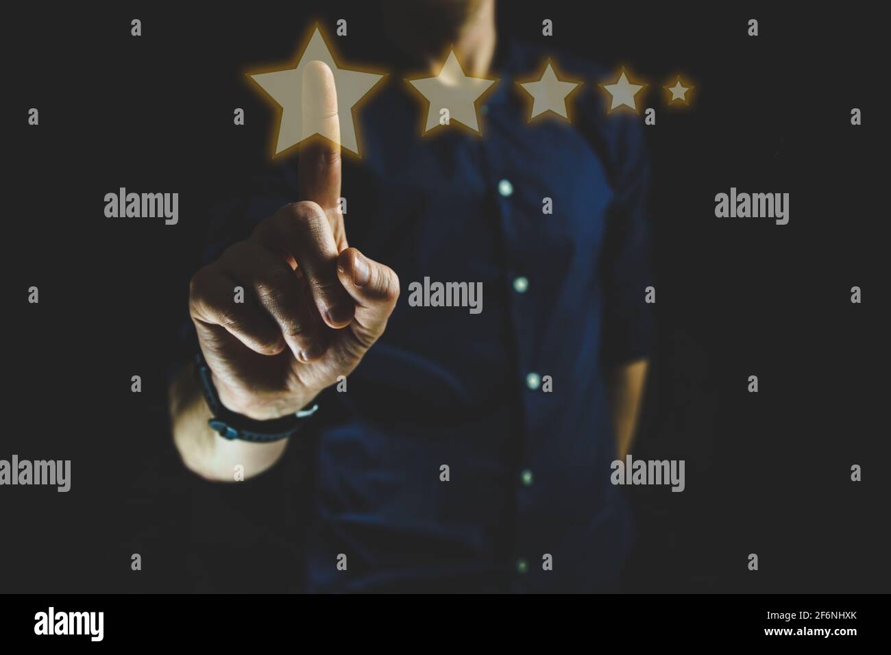 Man points on 5 star rating hologram. Five star rating on business ...