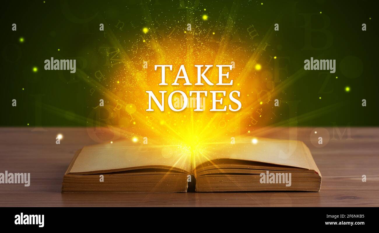 Educational inscription coming out from an open book Stock Photo - Alamy