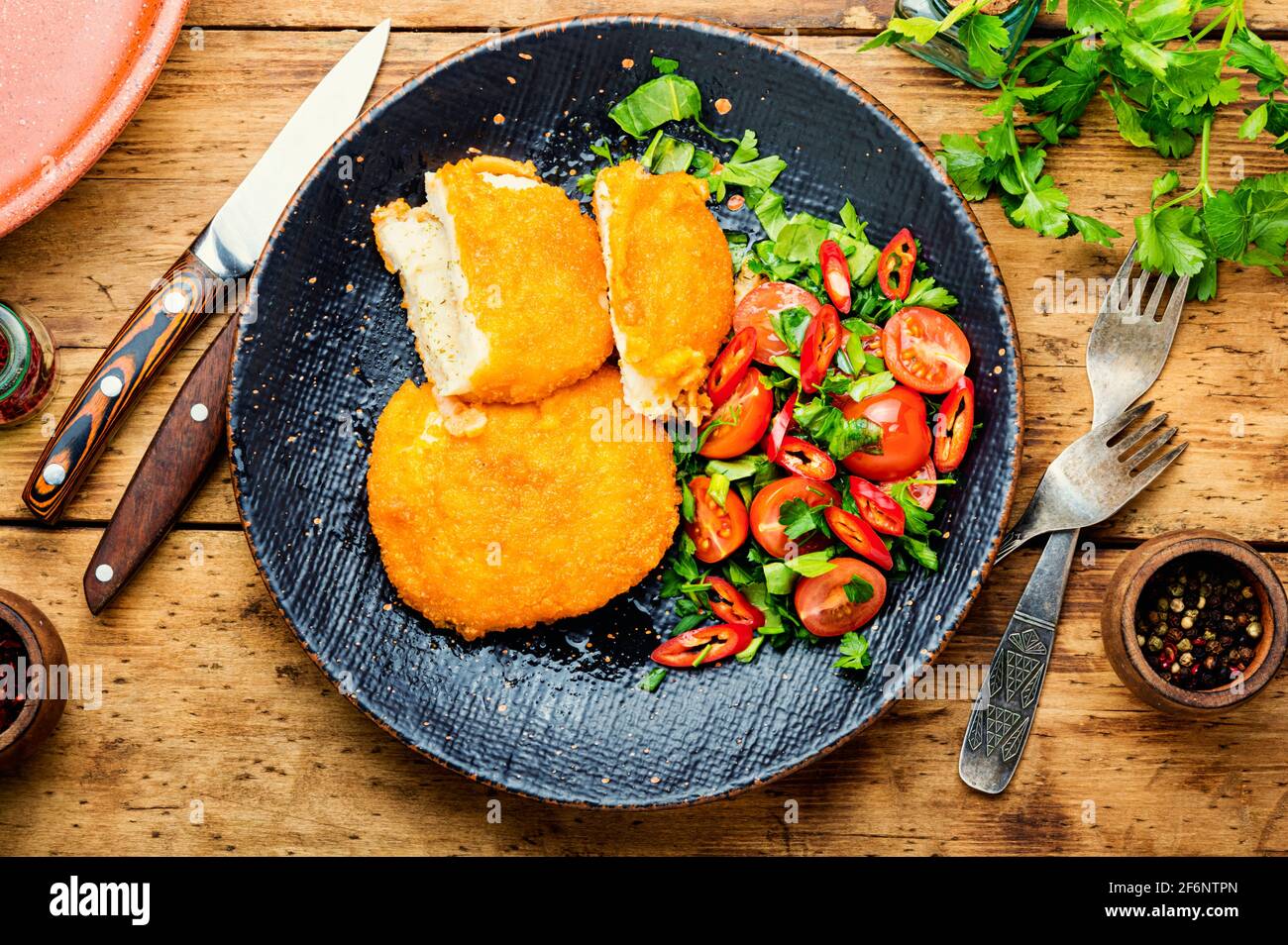 Kiev cutlet with fresh vegetable salad.Chicken meatballs Stock Photo ...