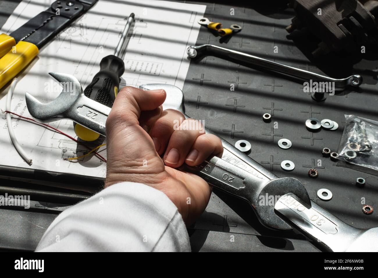 Worker holding power hand hi-res stock photography and images - Alamy