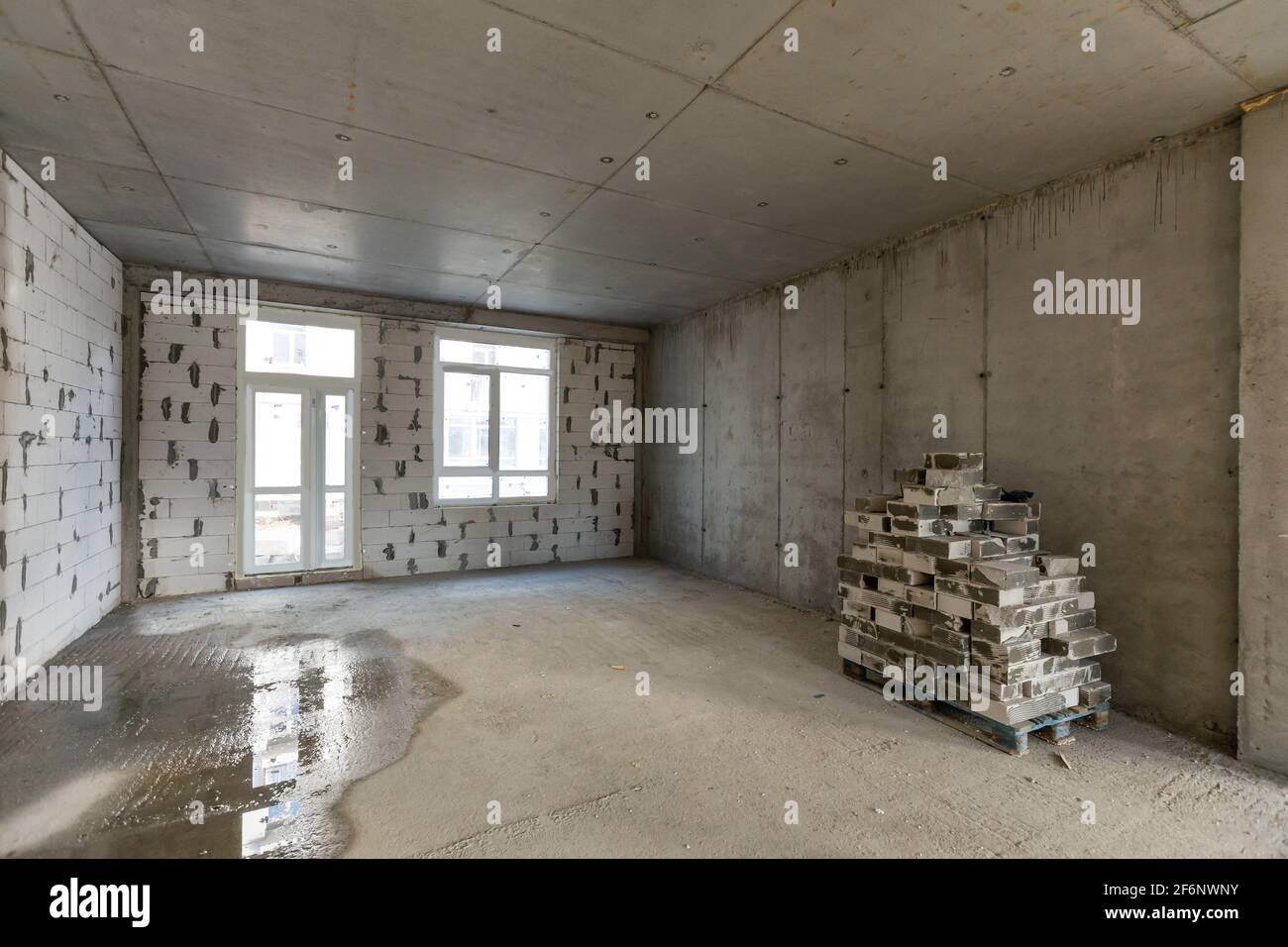 The Interior of the new room without finishing in the newly built high ...