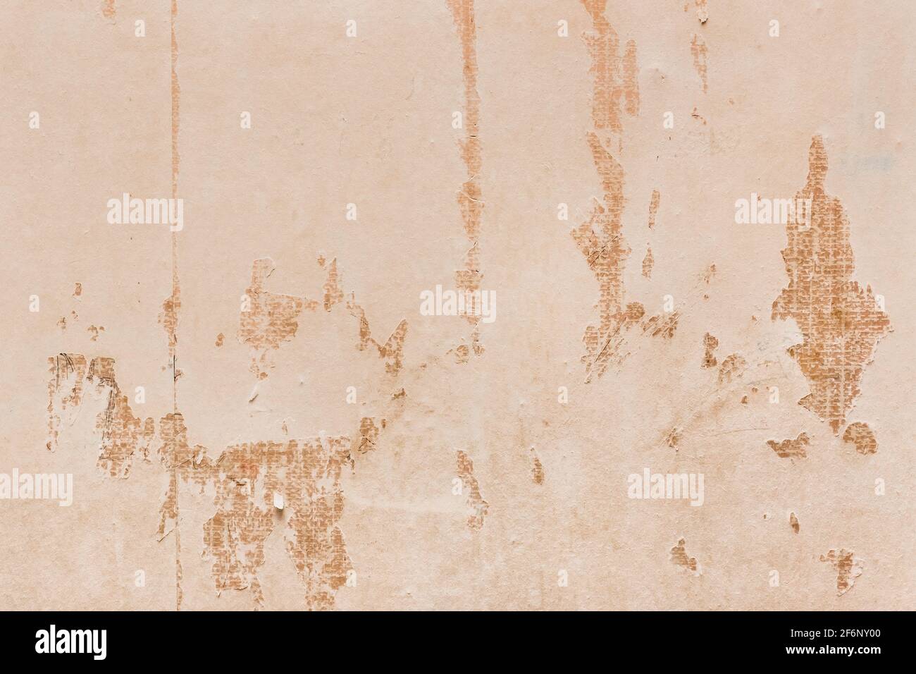 Old wallpaper on the wall background ,repair, reconstruction of the ...