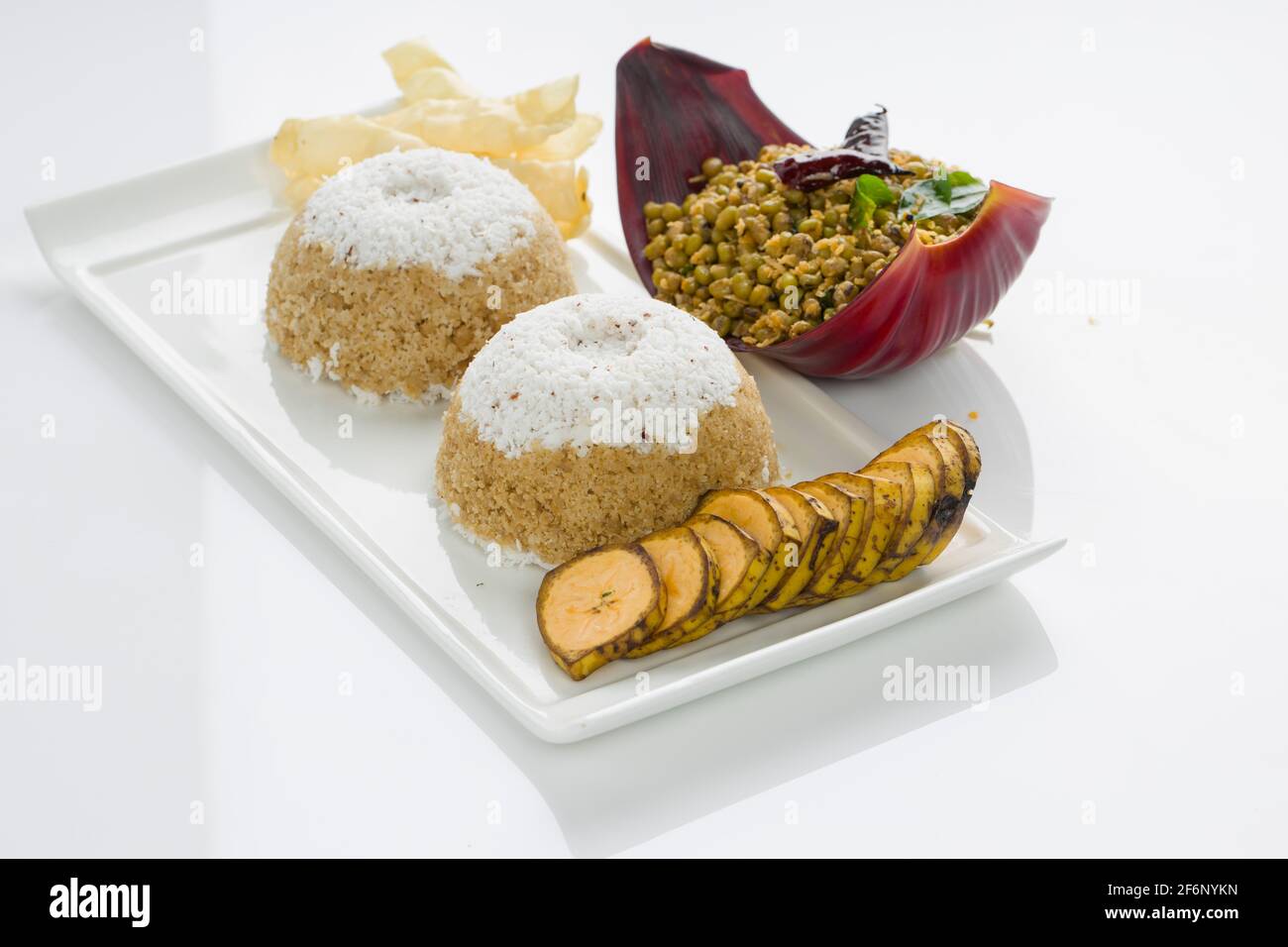 Cheratta puttu hi-res stock photography and images - Alamy