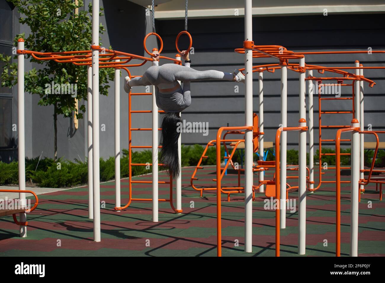 Gymnastic rings, legs, fitness woman hi-res stock photography and ...