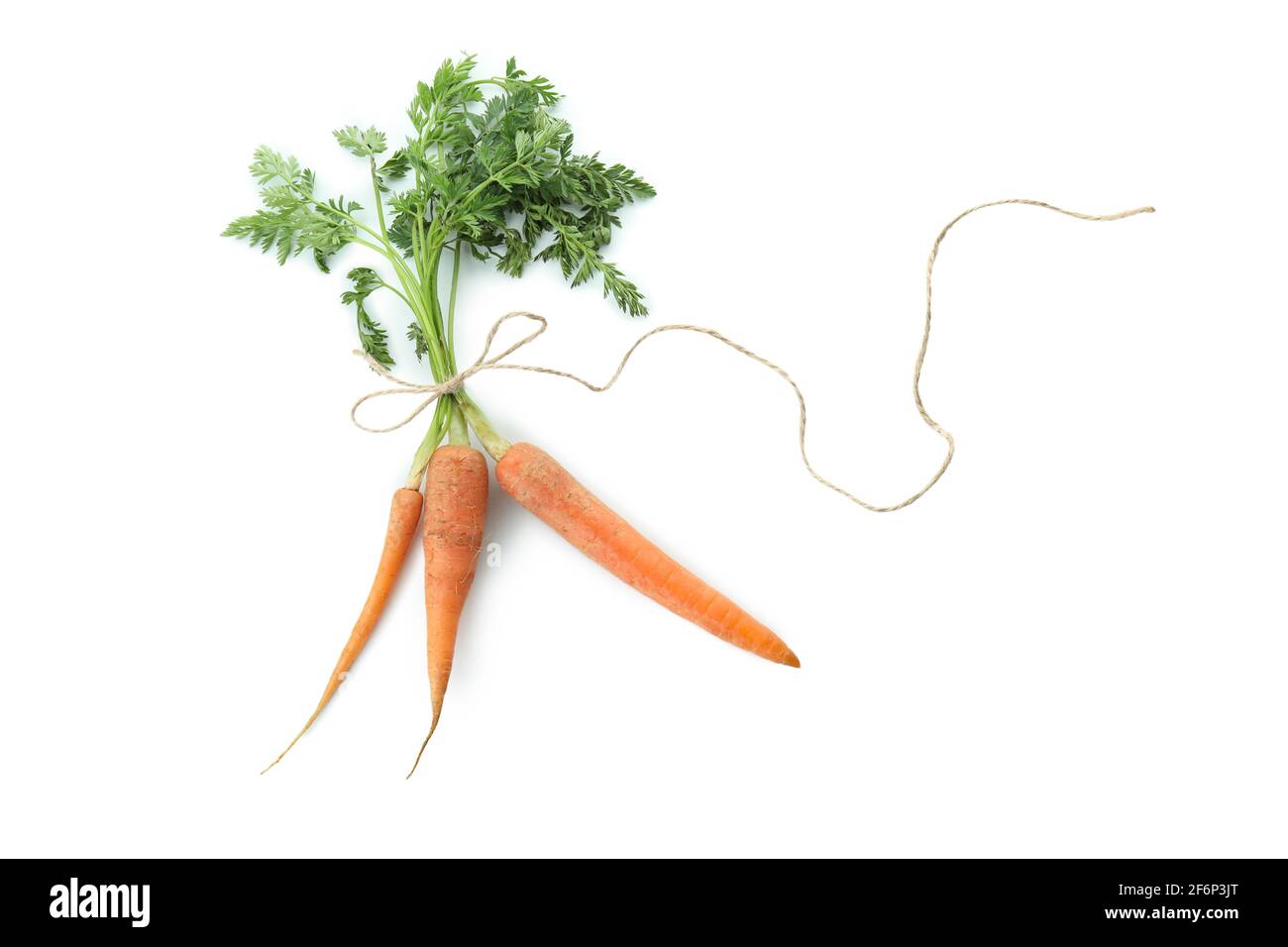 Fresh carrots tied with rope isolated on white background Stock Photo ...