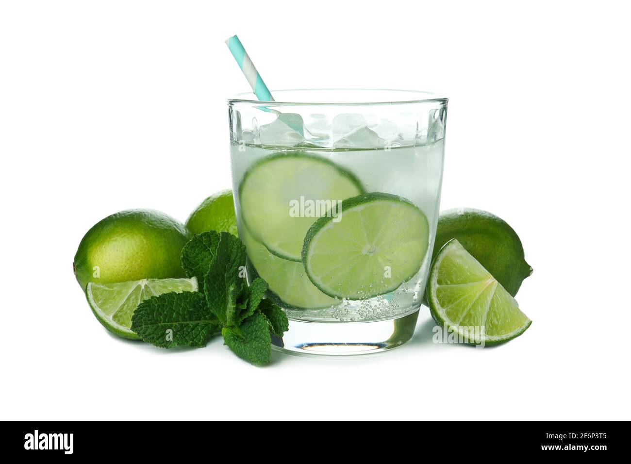 Glass of mojito cocktail and ingredients isolated on white background ...