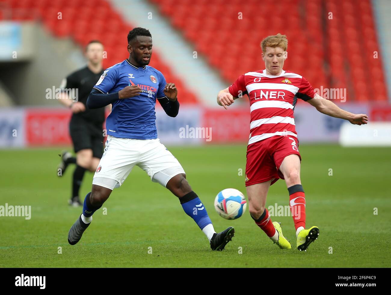 Doncaster rovers bradley halliday battle hi-res stock photography and ...