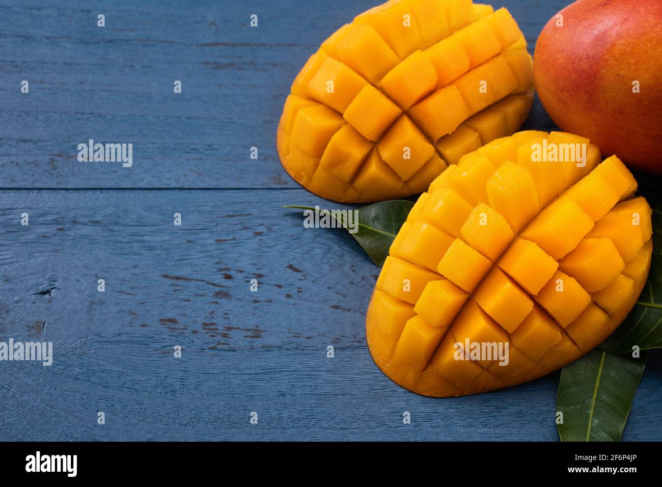 Top view design concept of beautiful mango tropical fruit with sliced ...