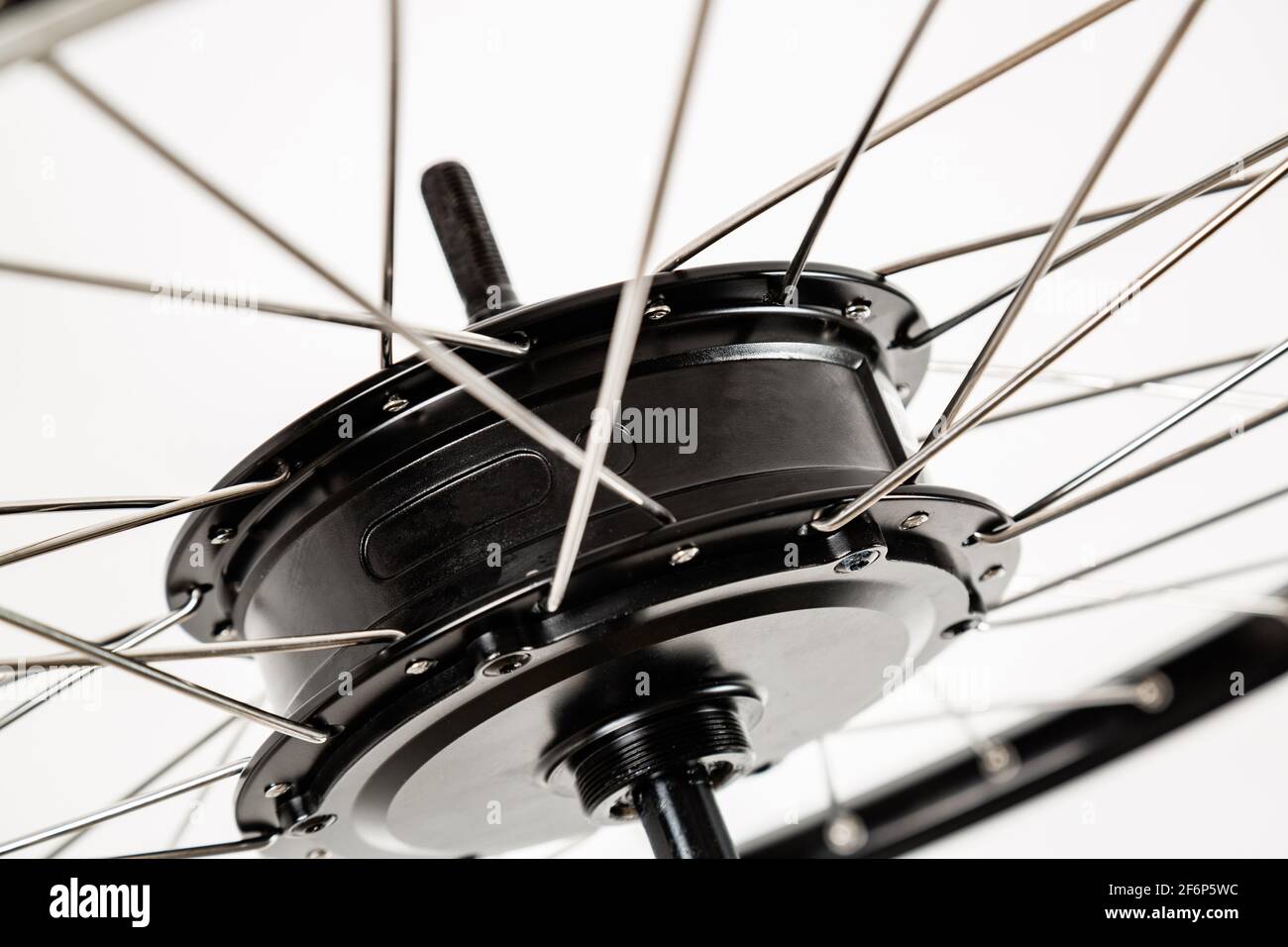 Electric motor close-up on a white background. A bicycle wheel Stock ...