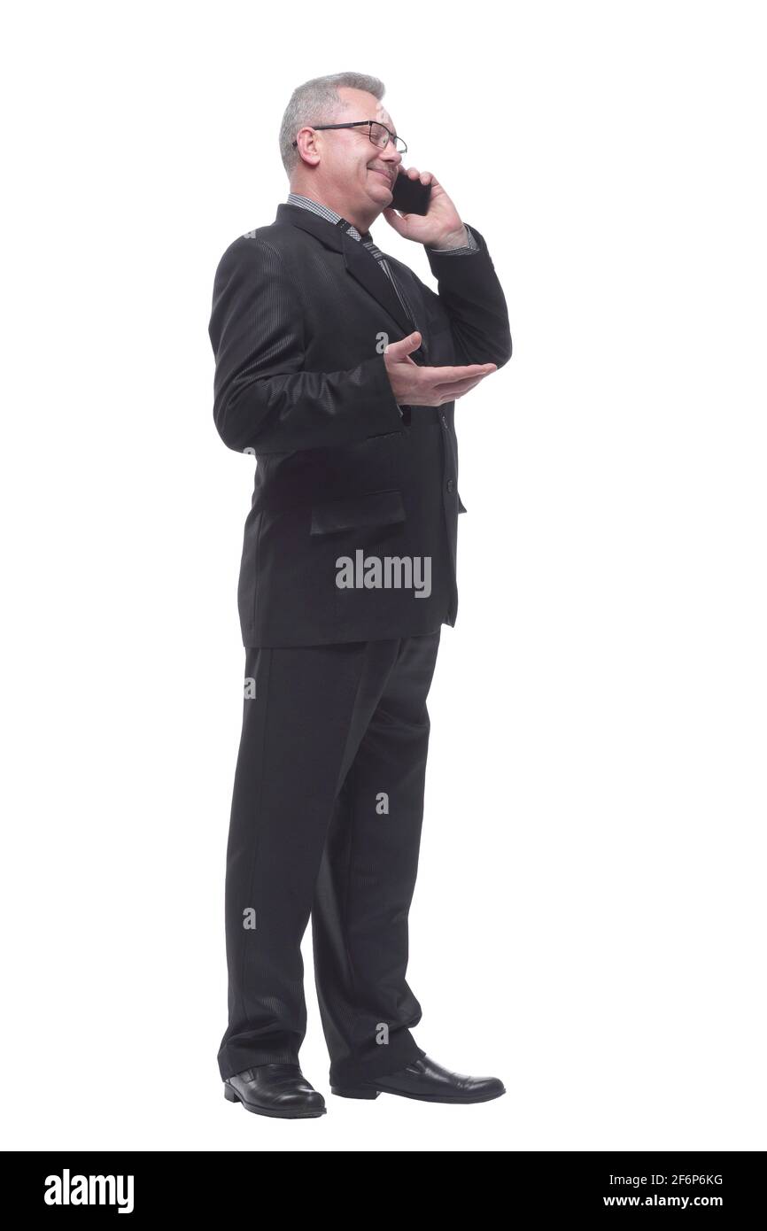 Business man talking on the phone standing over white background Stock ...