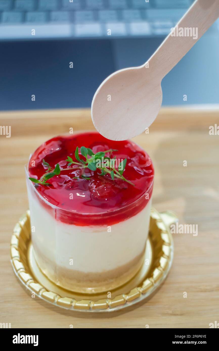Spoon on a piece of chesse cake, stock photo Stock Photo - Alamy