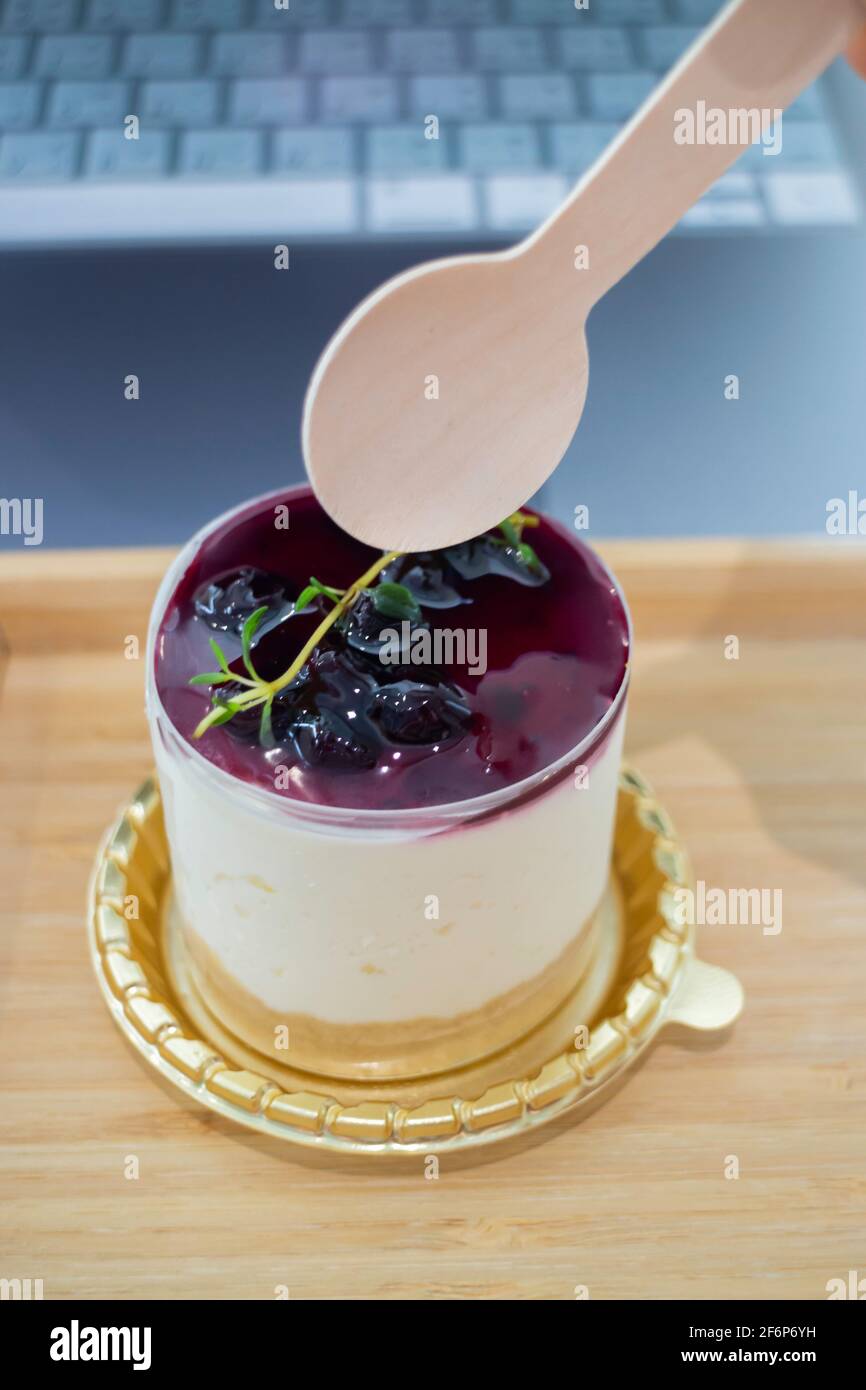 Spoon on a piece of chesse cake, stock photo Stock Photo - Alamy