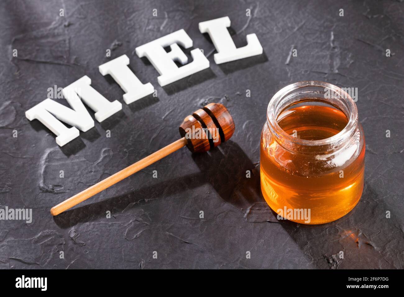 Natural organic honey - Word honey in wooden letters Stock Photo - Alamy