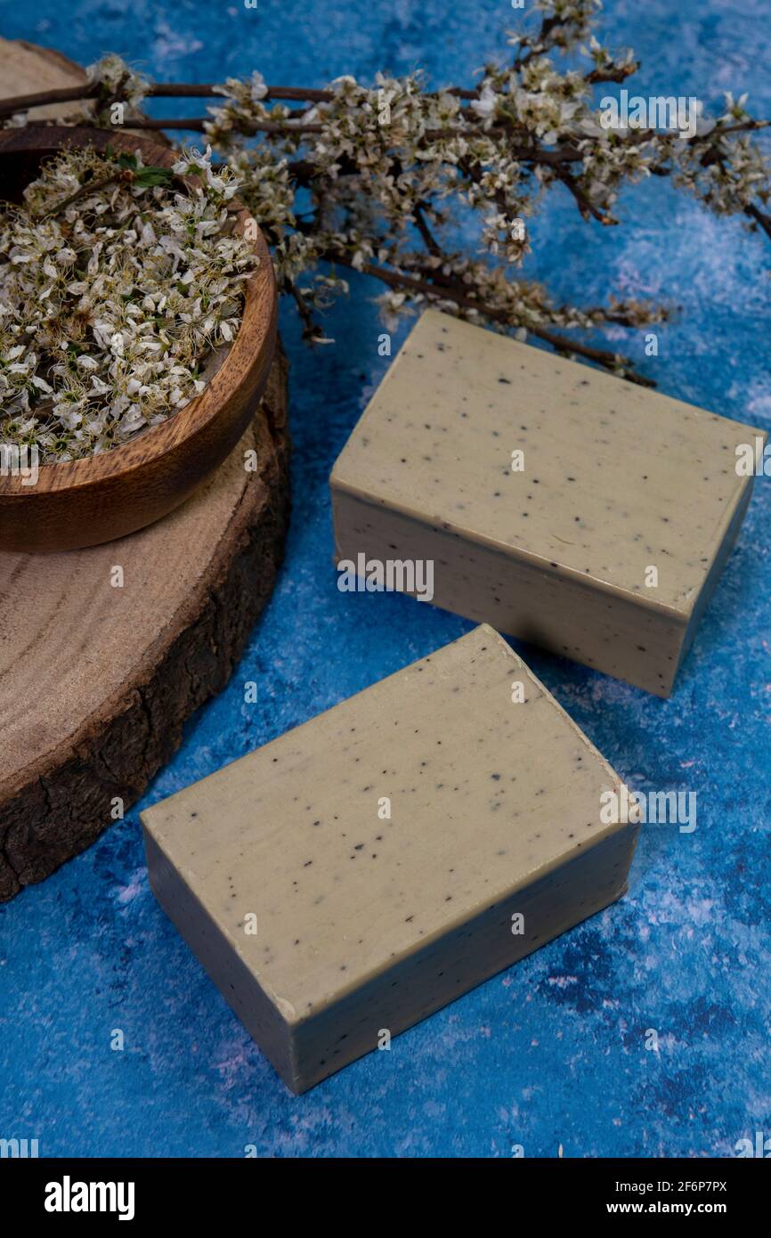 Aleppo soap and dray Laurus nobilis flower in a wooden plate Stock ...