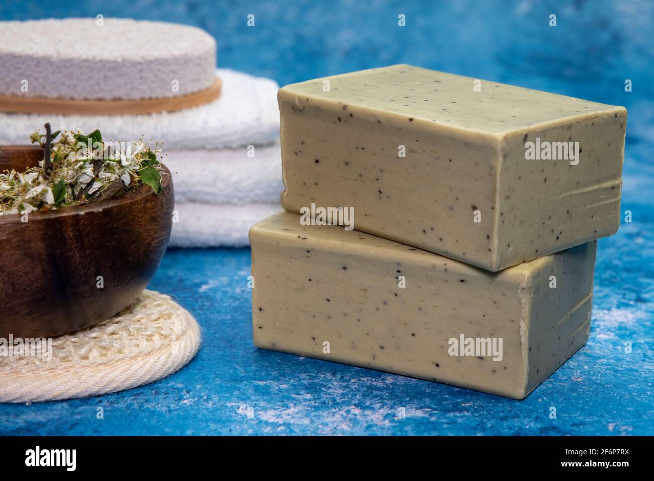 Aleppo soap and dray Laurus nobilis flower in a wooden plate Stock ...