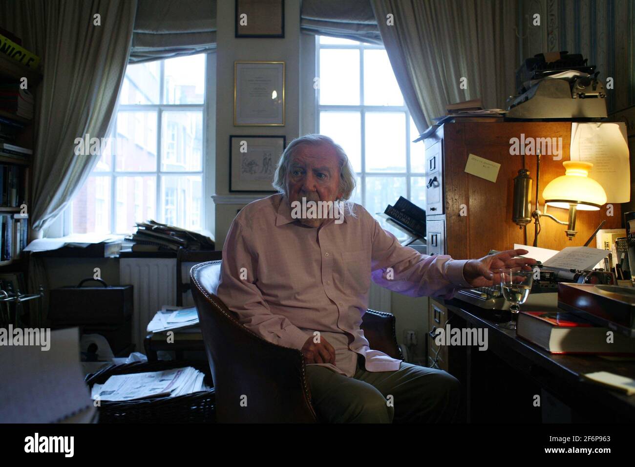 THE WRITER KEITH WATERHOUSE IN HIS STUDY AT HOME IN LONDON SW5.PHOTO ...
