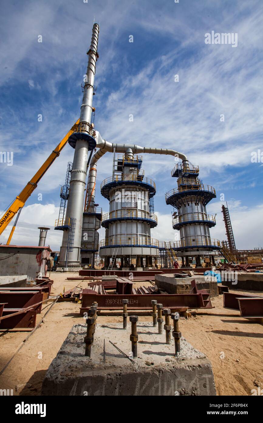 Aktau, Kazakhstan - May 19, 2012: Construction of asphaltic bitumen ...