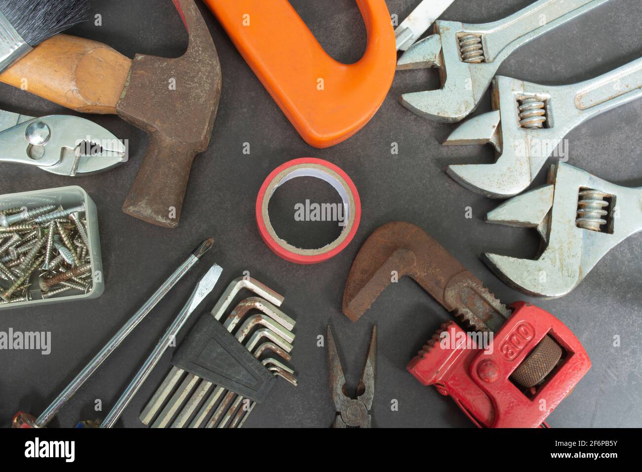 Repair equipment and many handy tools on a dark background Stock Photo ...