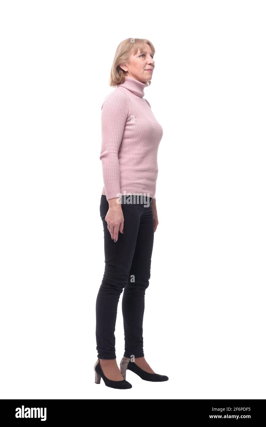 A senior woman - over sixty years old standing on white background ...