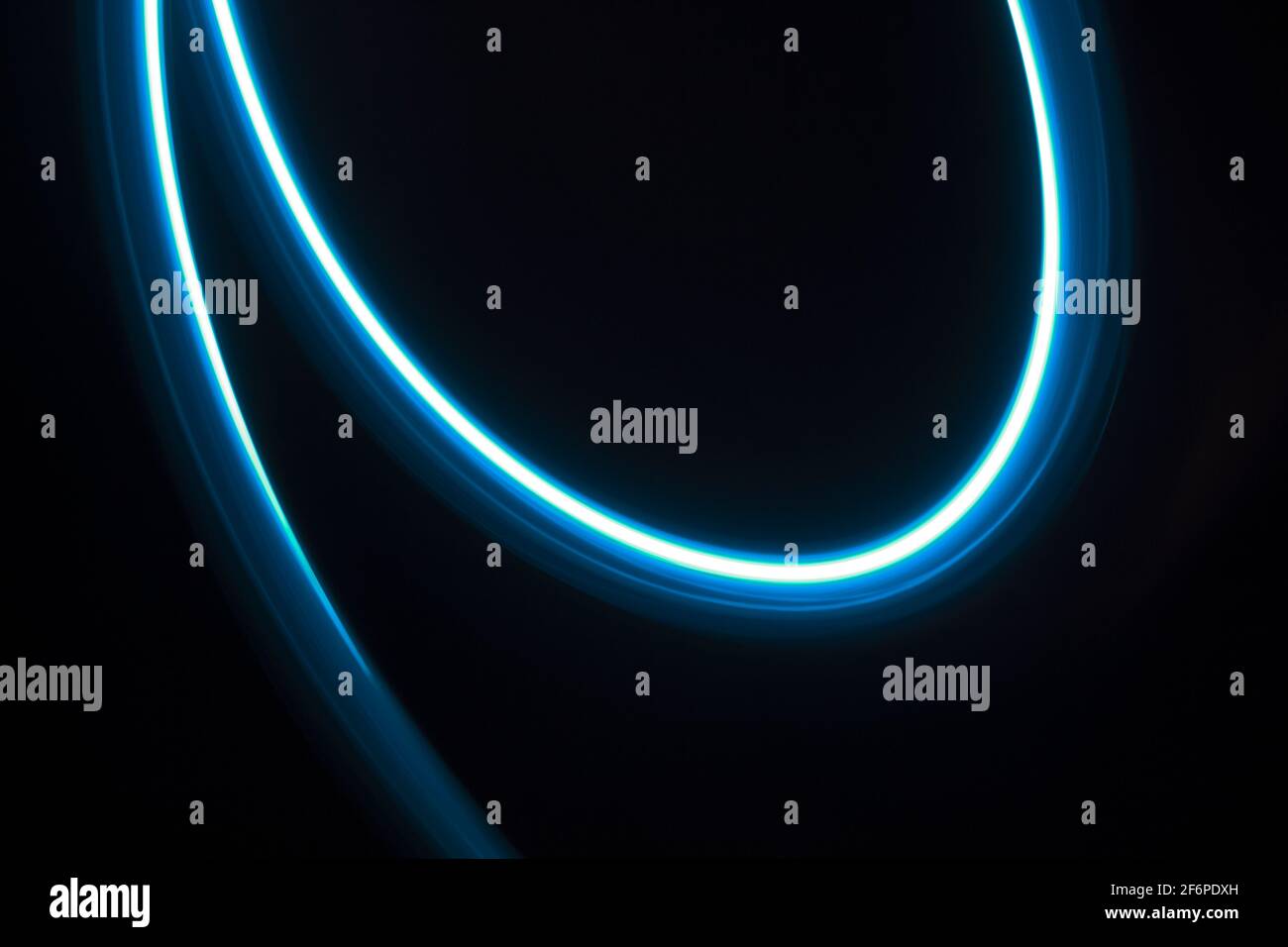 blue light lines on a black background Stock Photo - Alamy