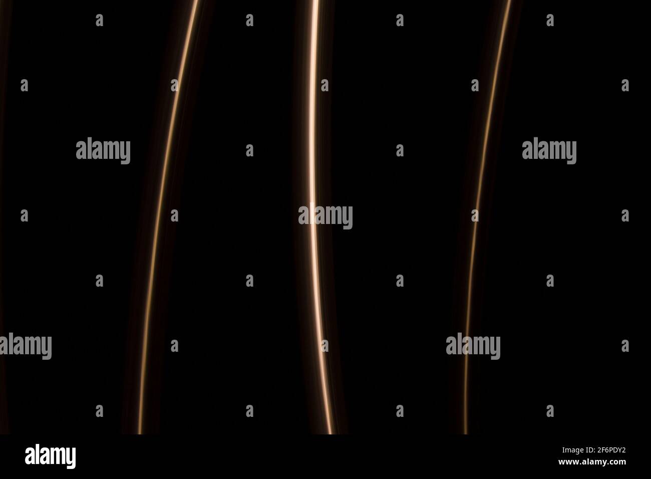 gold light lines on a black background Stock Photo - Alamy